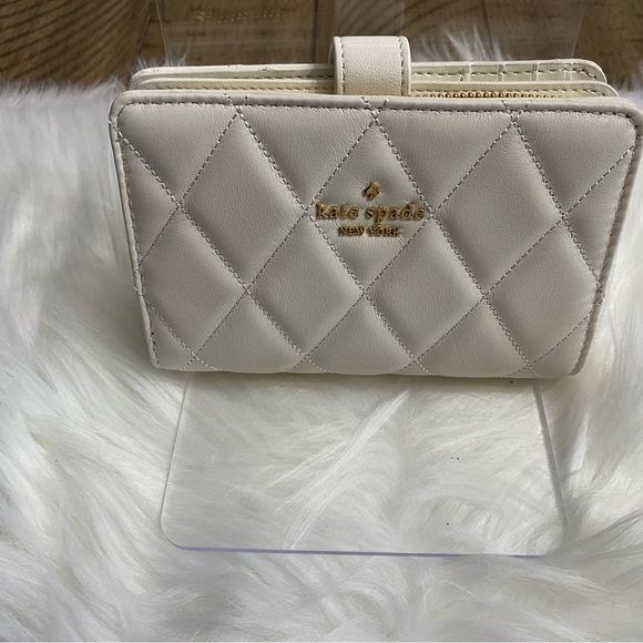 kate spade | Bags | Kate Spade Cream Quilted Wallet With Gold Logo ...